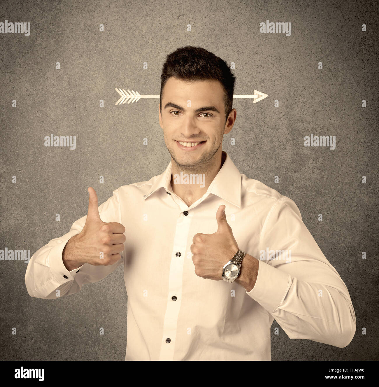 Young sales guy with arrow in the head Stock Photo - Alamy
