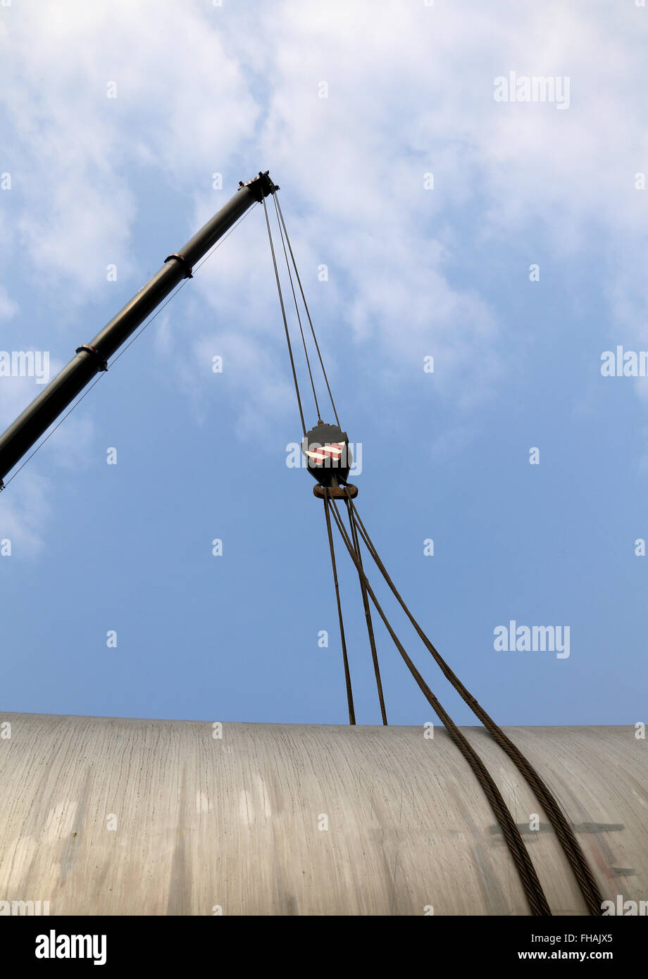 big pulley with steel cables to lift heavy loads Stock Photo - Alamy