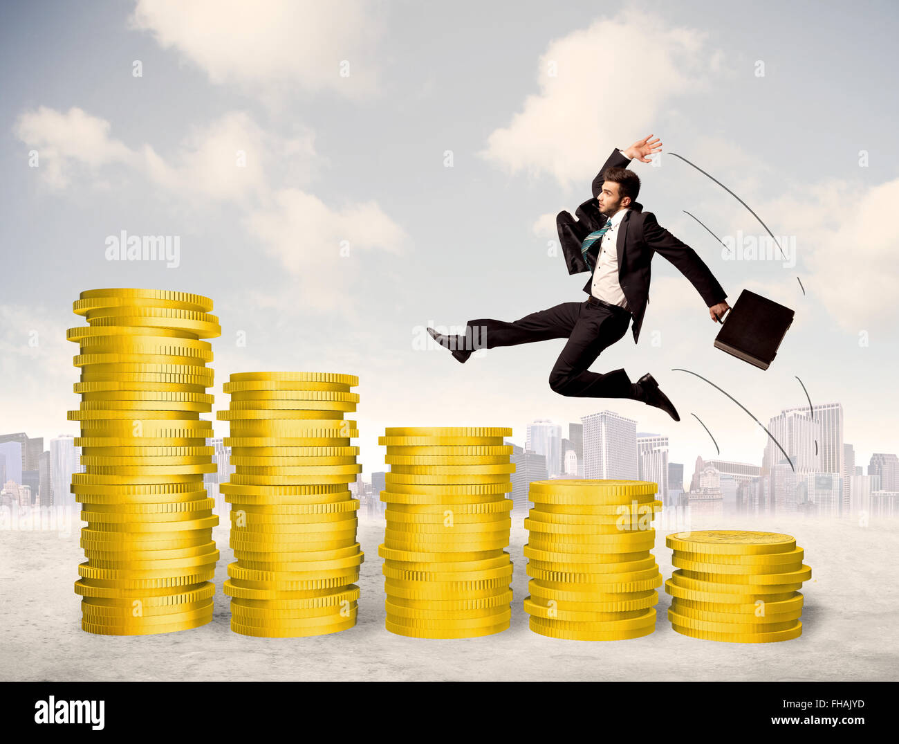 Successful business man jumping up on gold coin money Stock Photo - Alamy