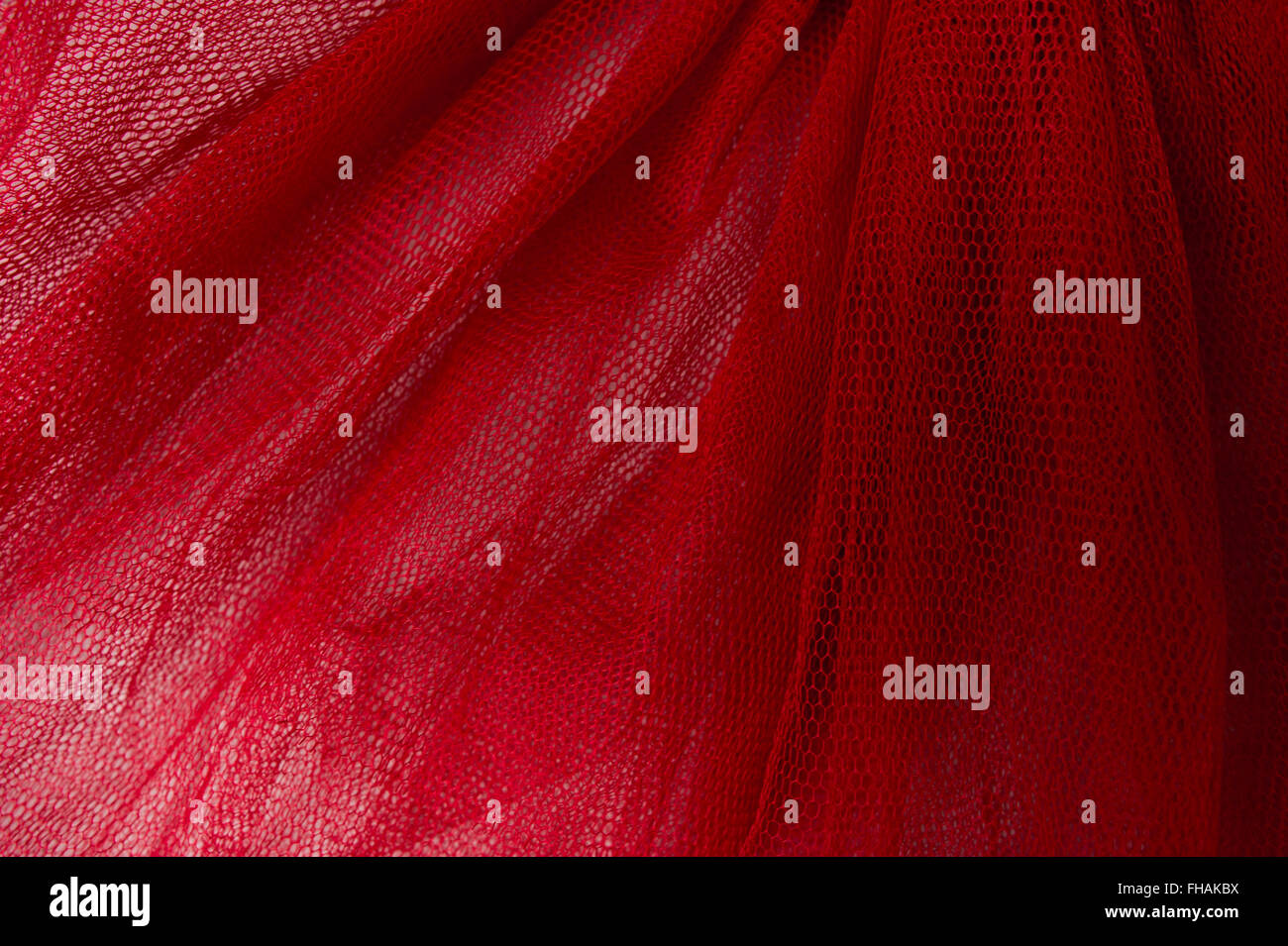 red fabric background tulle pattern Stock Photo - Alamy