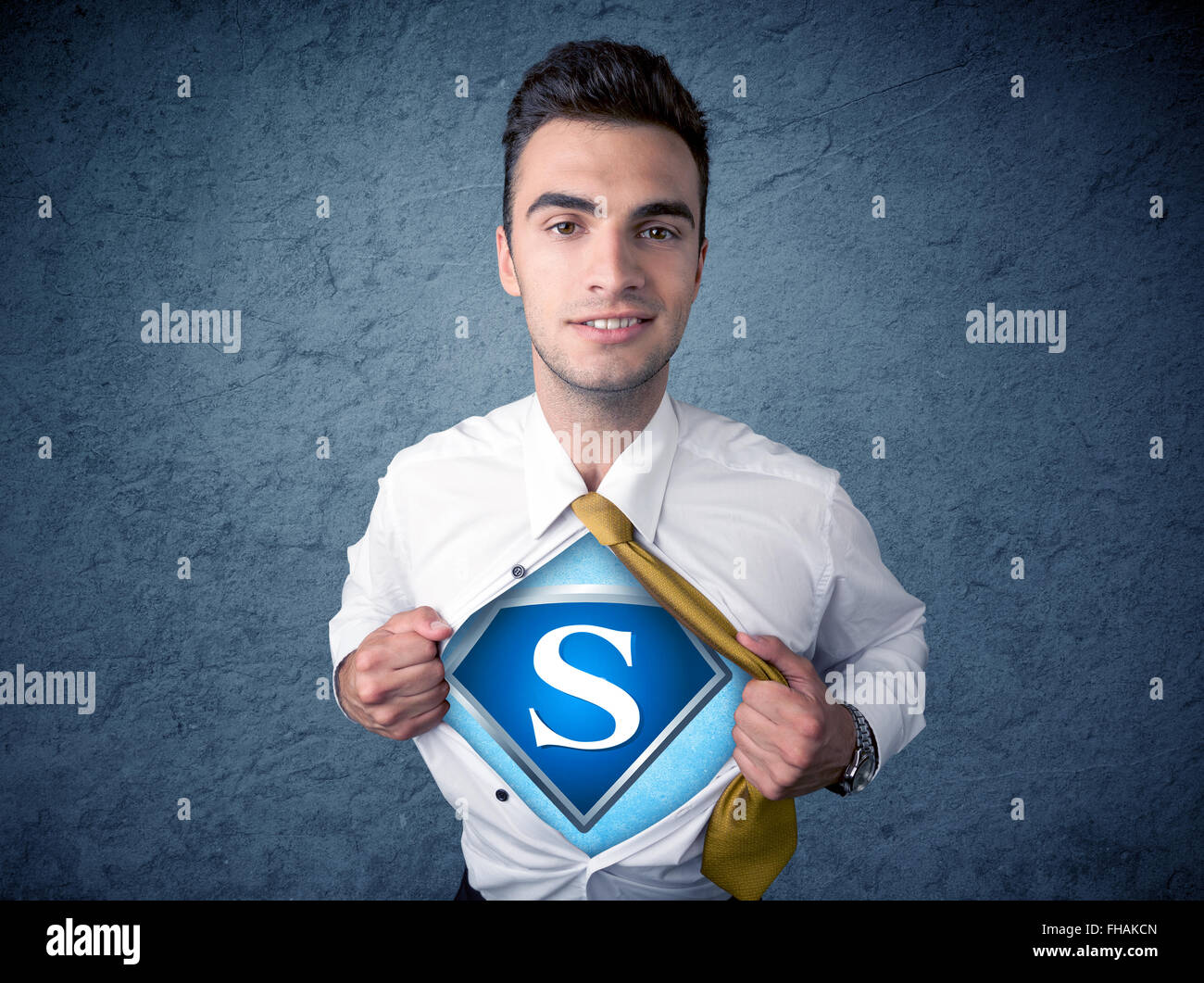 Businessman ripping off his shirt with superhero sign Stock Photo - Alamy
