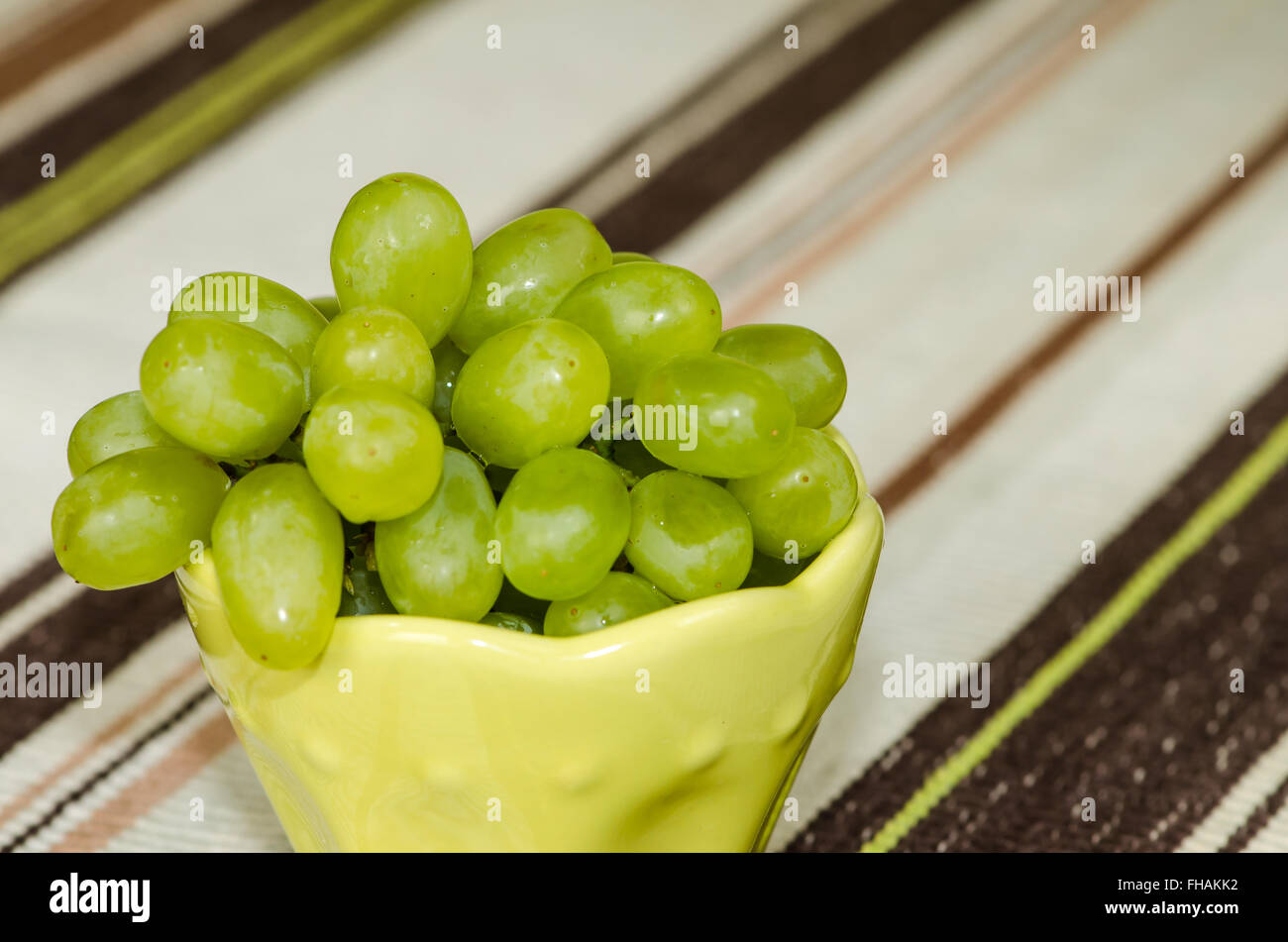 green grapes on colorful background Stock Photo - Alamy