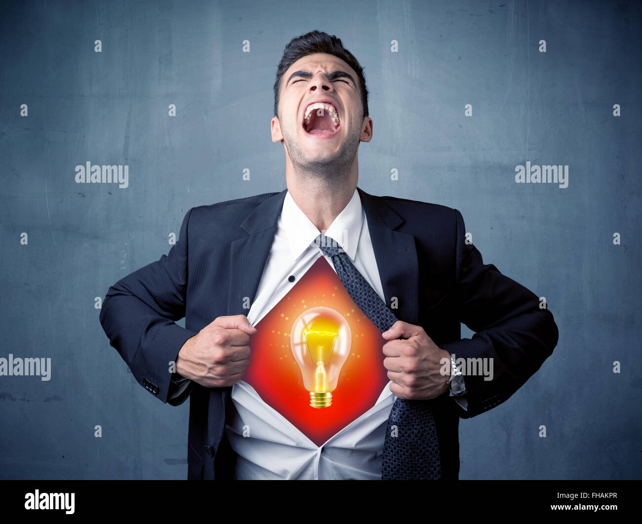 Superman ripping off shirt hi-res stock photography and images - Alamy