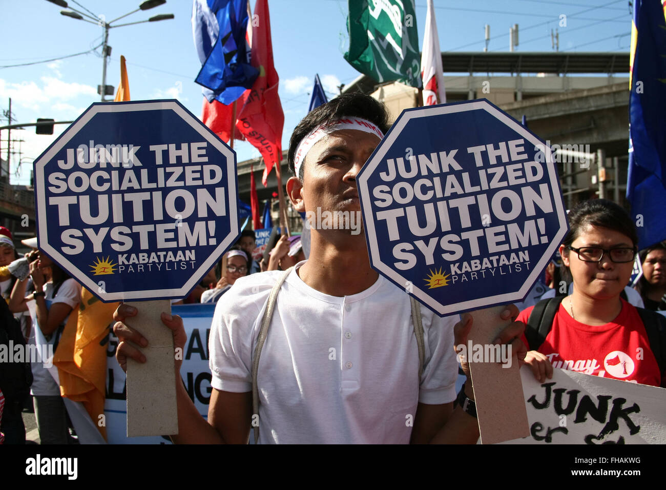 Manila, Philippines. 24th Feb, 2016. Students carry signs against the ...