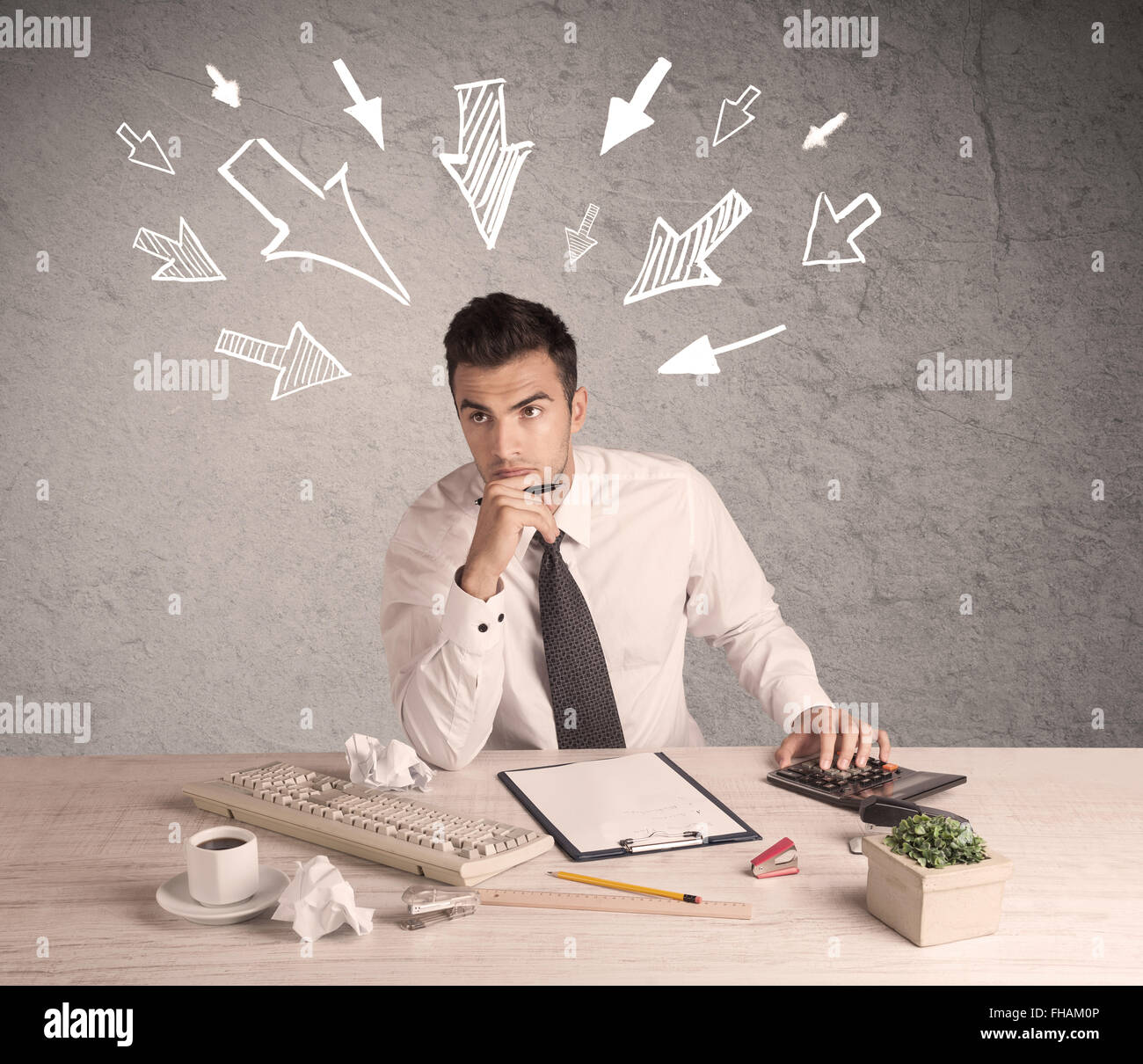 Busy office worker with drawn arrows Stock Photo - Alamy