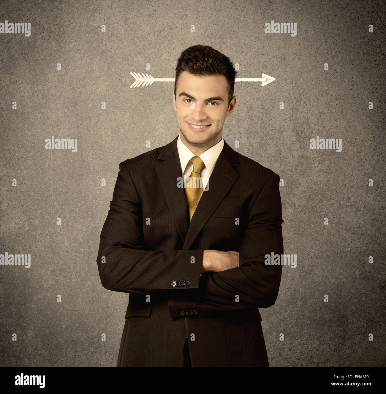 Young sales guy with arrow in the head Stock Photo - Alamy