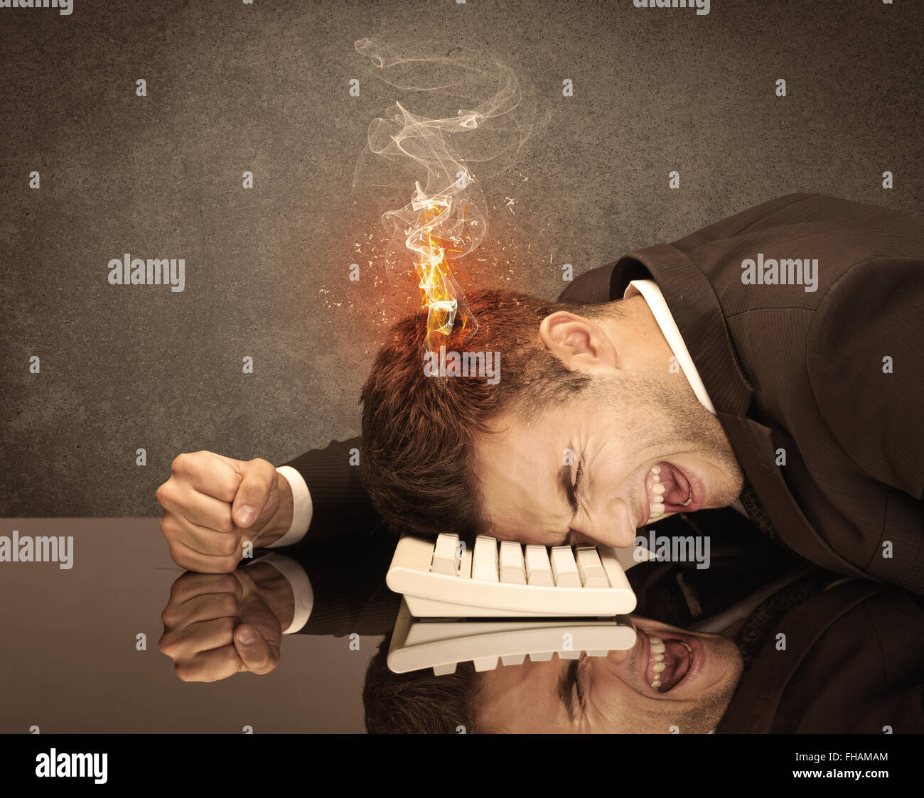 Sad business person's head catching fire Stock Photo - Alamy