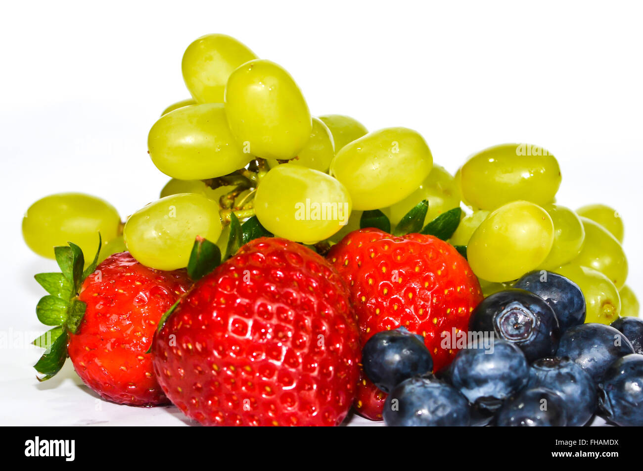 strawberry, grape and bilberries on white background Stock Photo - Alamy