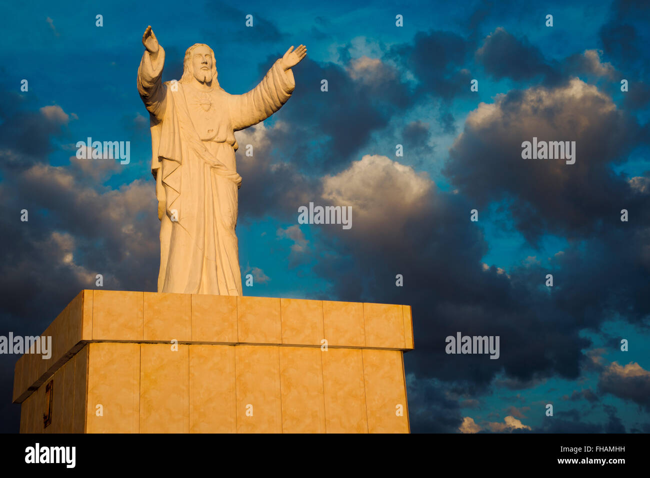 Jesus sculpture shooted a sunset in Iloilo Philippines Stock Photo - Alamy