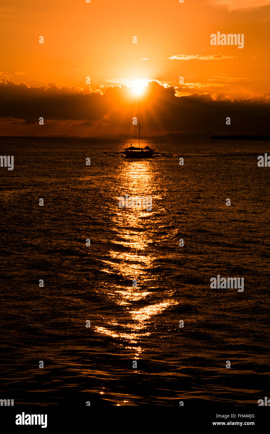 Philippines boat transport on sunset in Iloilo Stock Photo - Alamy