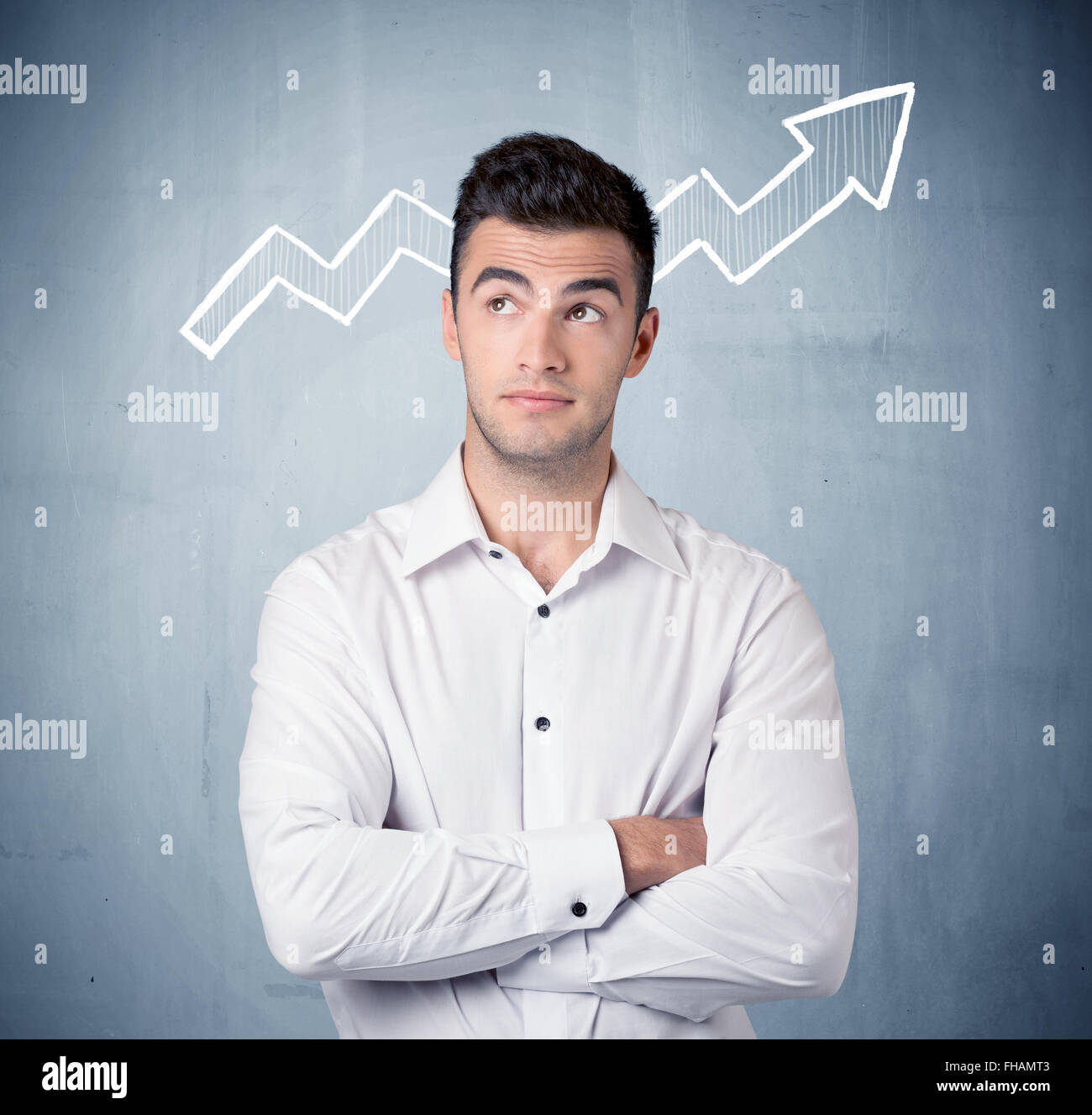 Smiling business guy with graph arrow Stock Photo - Alamy