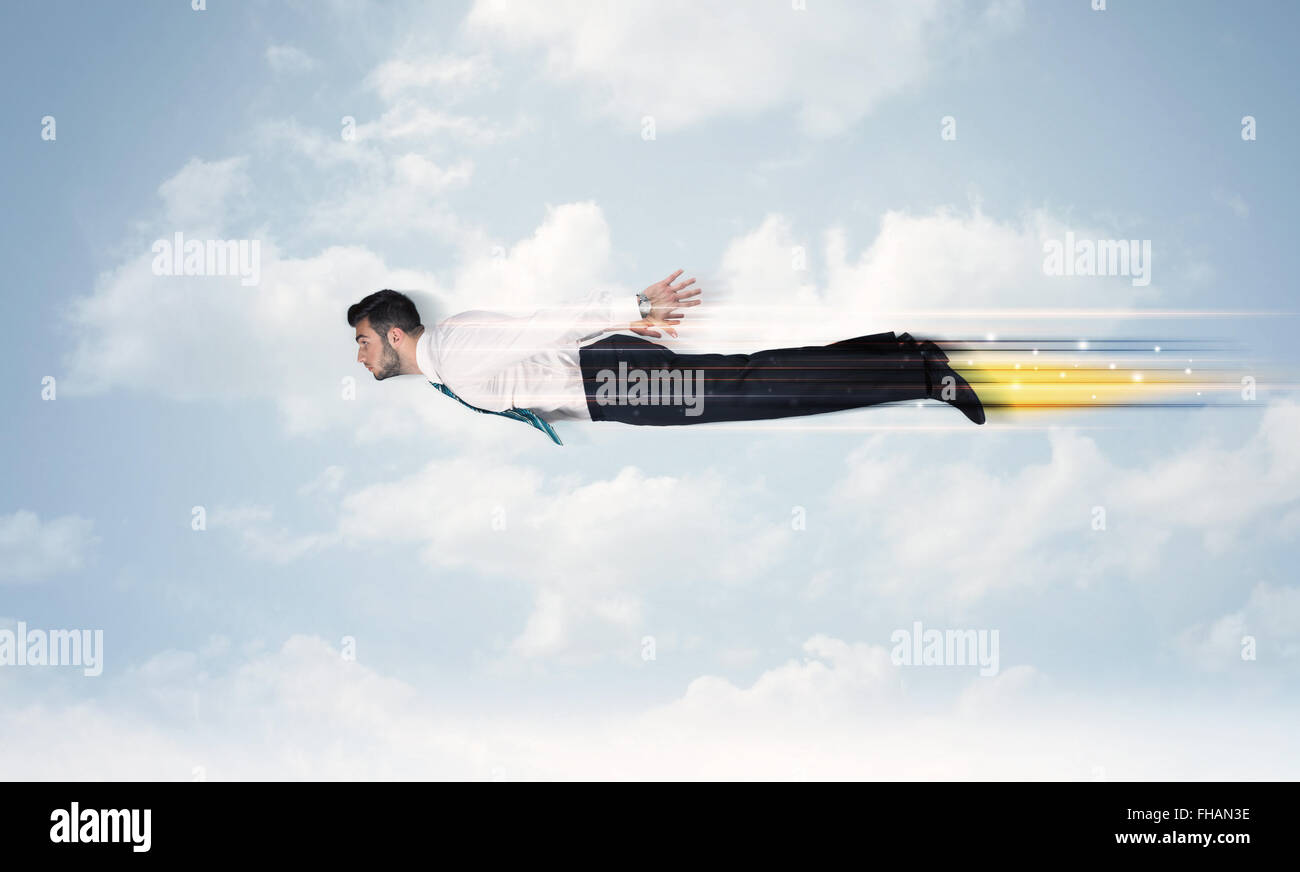 Happy business man flying fast on the sky between clouds Stock Photo ...