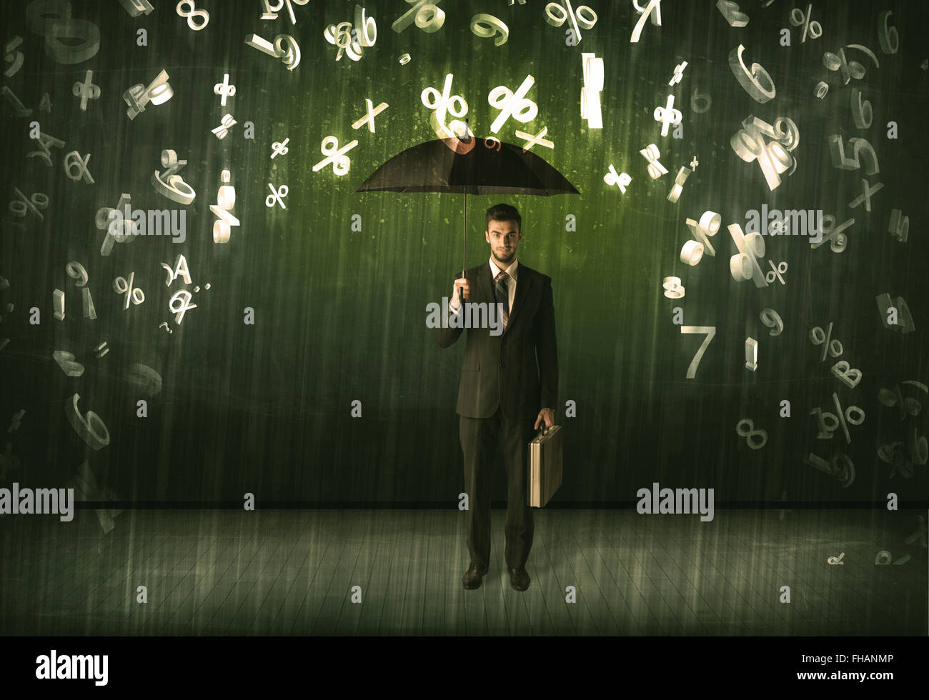 Businessman standing with umbrella and 3d numbers raining concept Stock ...