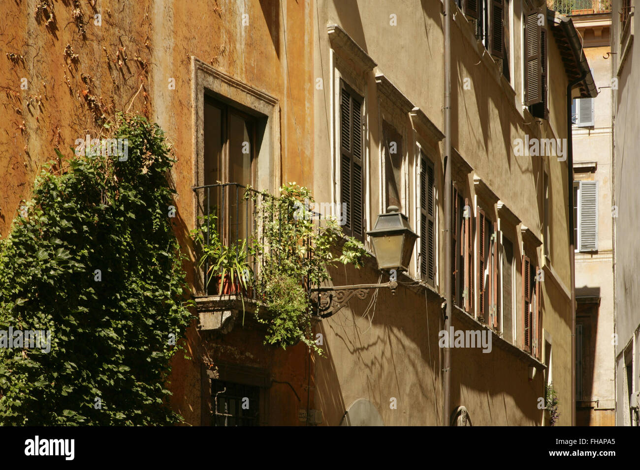 Shuttered apartment windows in sidestreet, Rome, Italy Stock Photo - Alamy