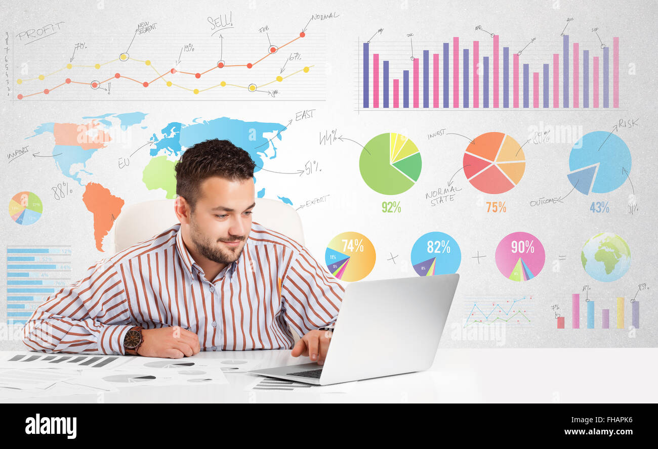 Business man with colorful charts Stock Photo - Alamy