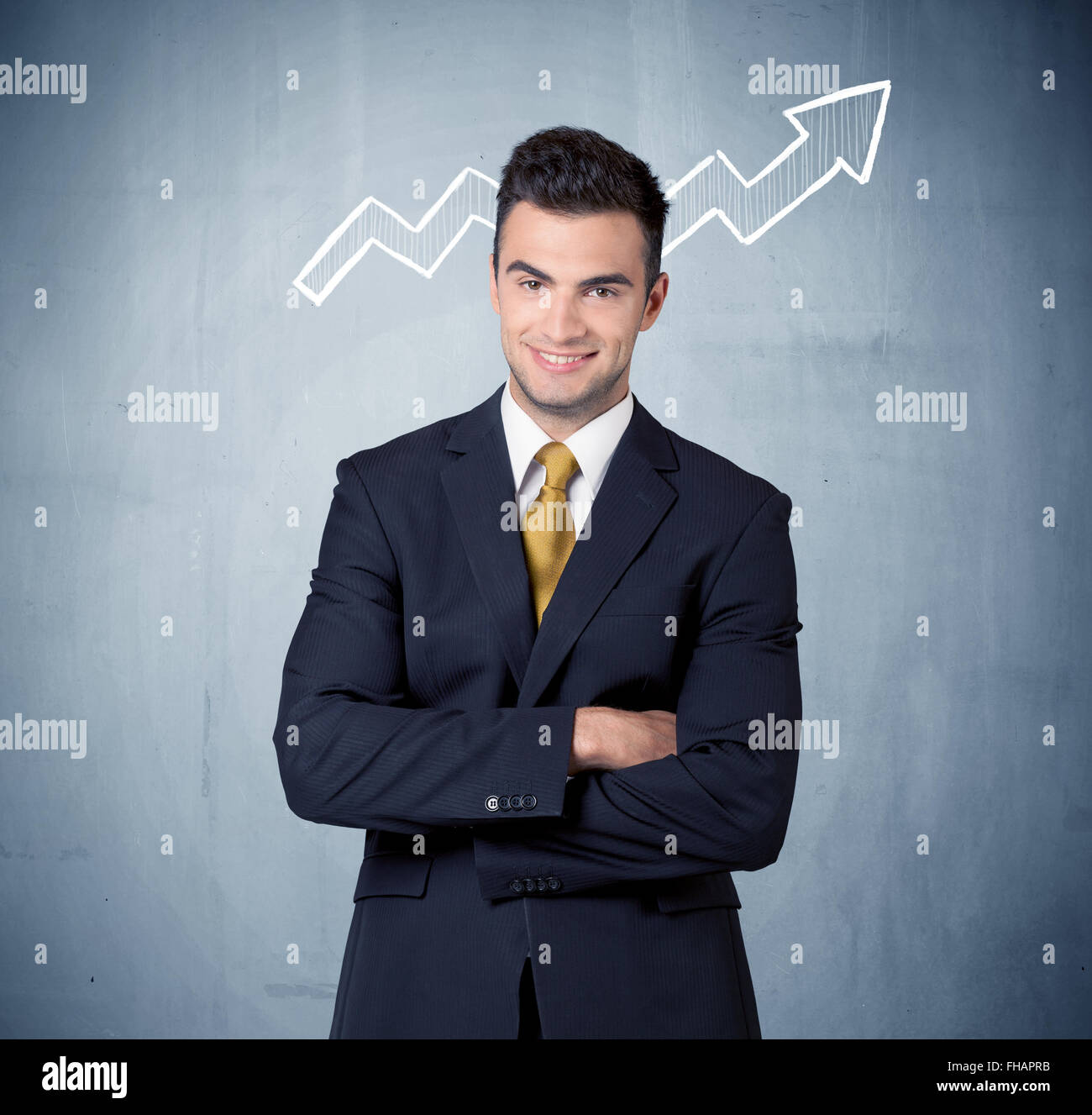 Smiling business guy with graph arrow Stock Photo - Alamy