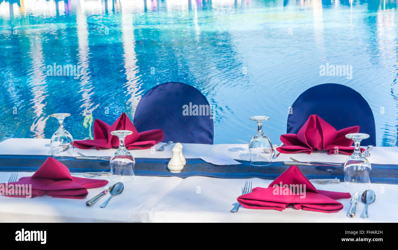 having special menu beside ocean blue water pool Stock Photo - Alamy