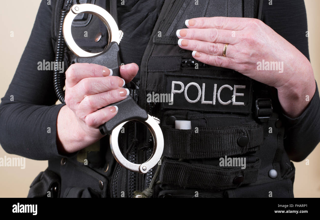 Woman with handcuffs hi-res stock photography and images - Alamy