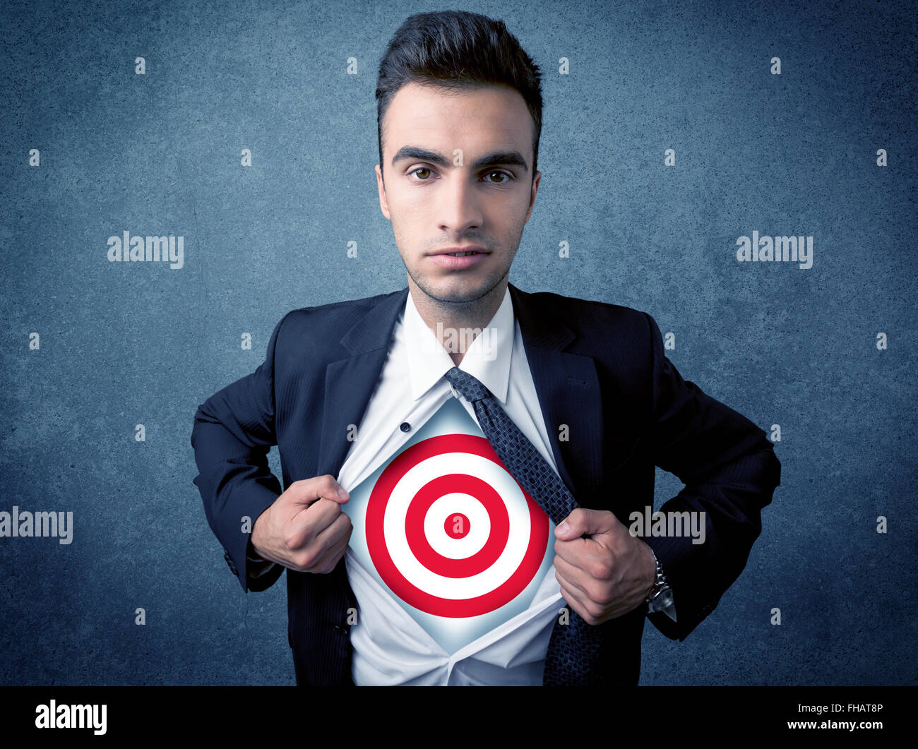 Businessman tearing shirt with target sign on his chest Stock Photo - Alamy