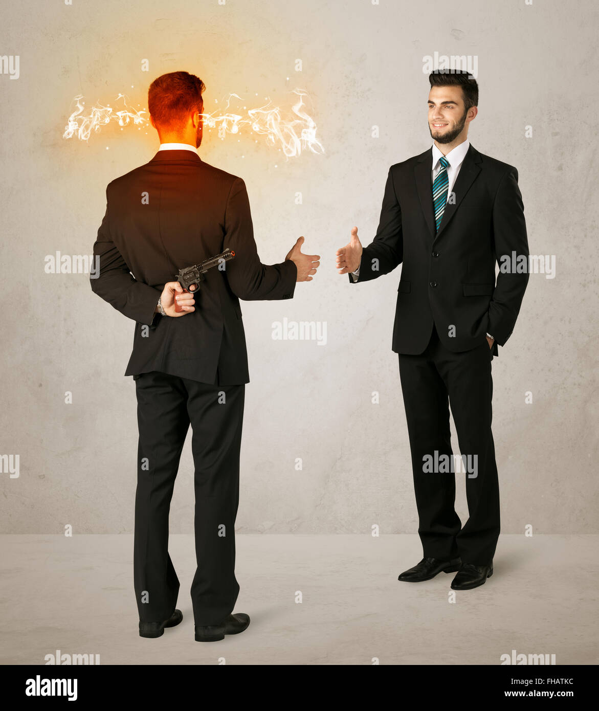 Angry businessman with weapon Stock Photo - Alamy