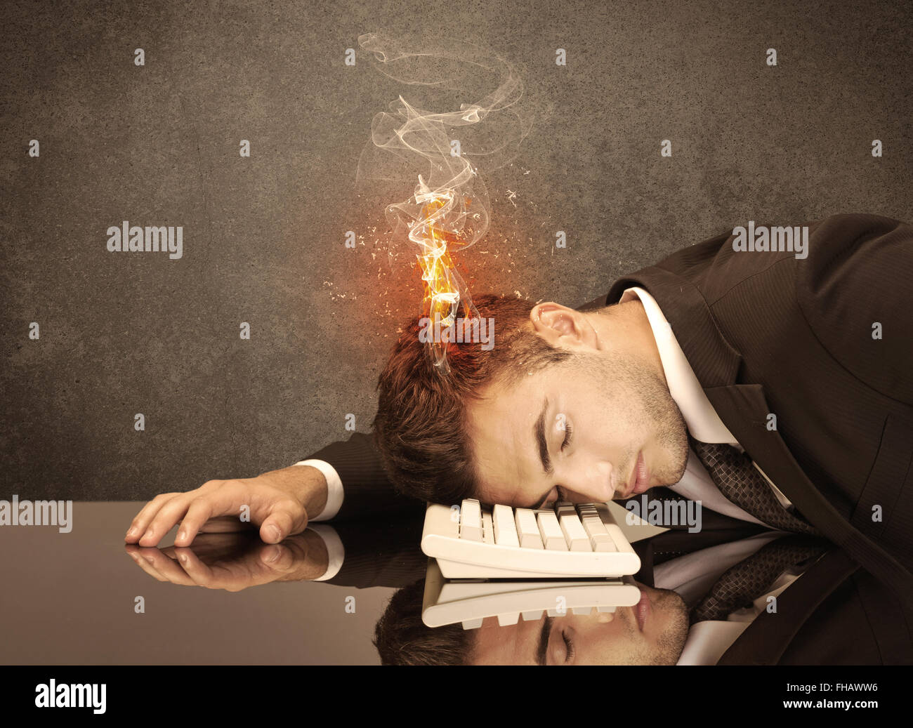 Sad business person's head catching fire Stock Photo - Alamy