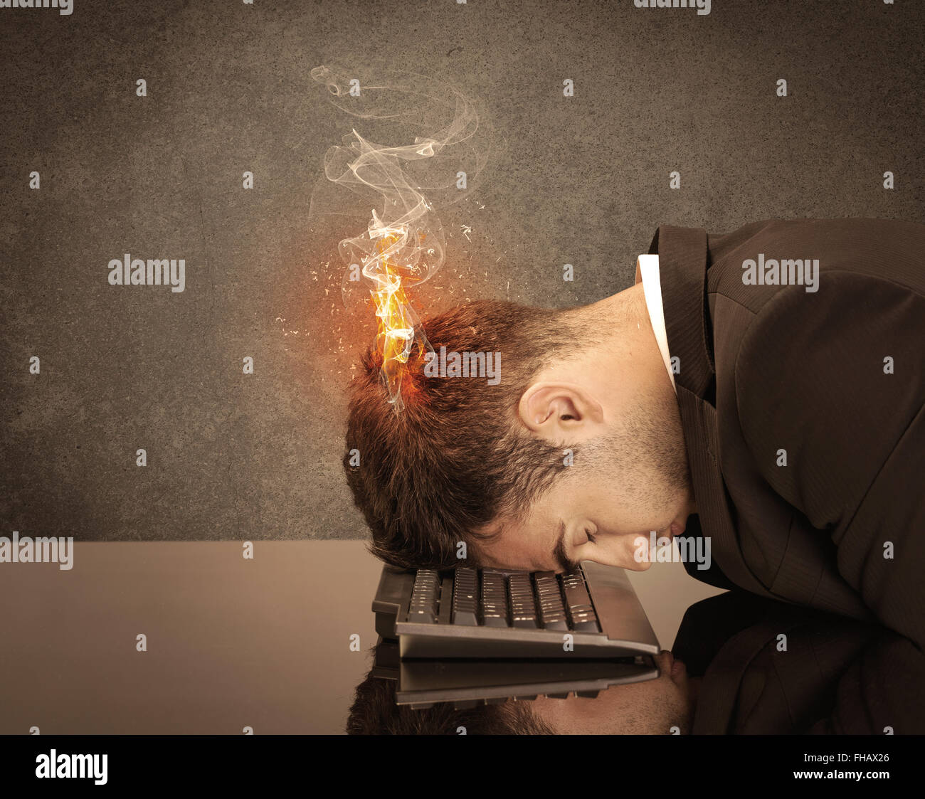 Sad business person's head catching fire Stock Photo - Alamy