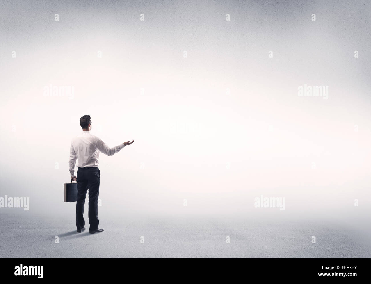 Sales person with empty white background Stock Photo - Alamy