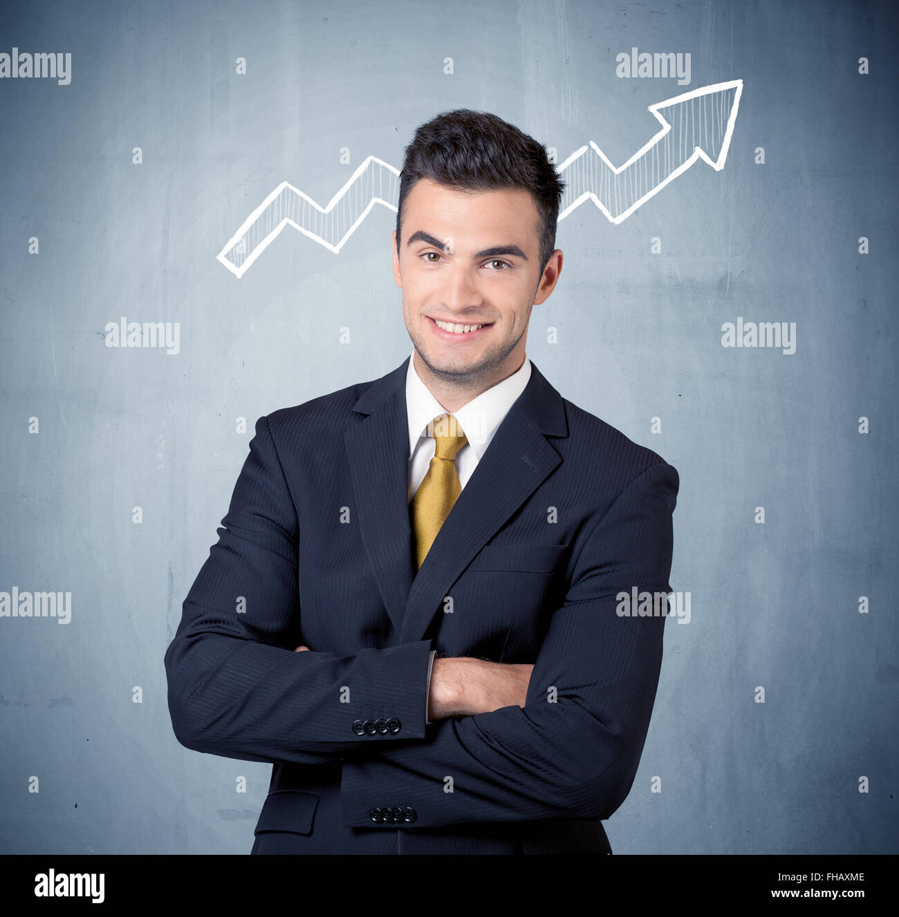 Smiling business guy with graph arrow Stock Photo - Alamy