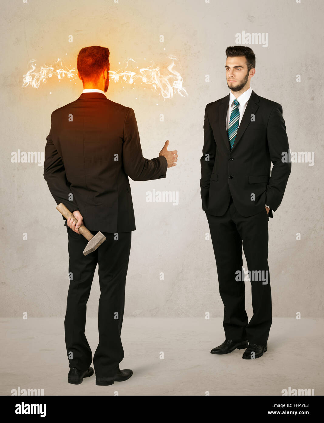 Angry businessman with weapon Stock Photo - Alamy