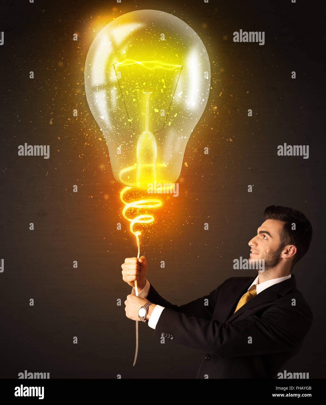 Professional businessman bulb idea hi-res stock photography and images ...