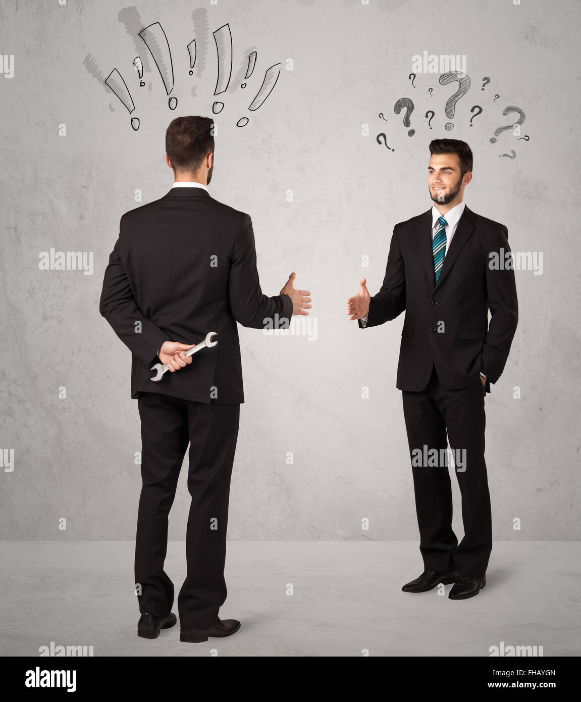 Ruthless business handshake Stock Photo - Alamy