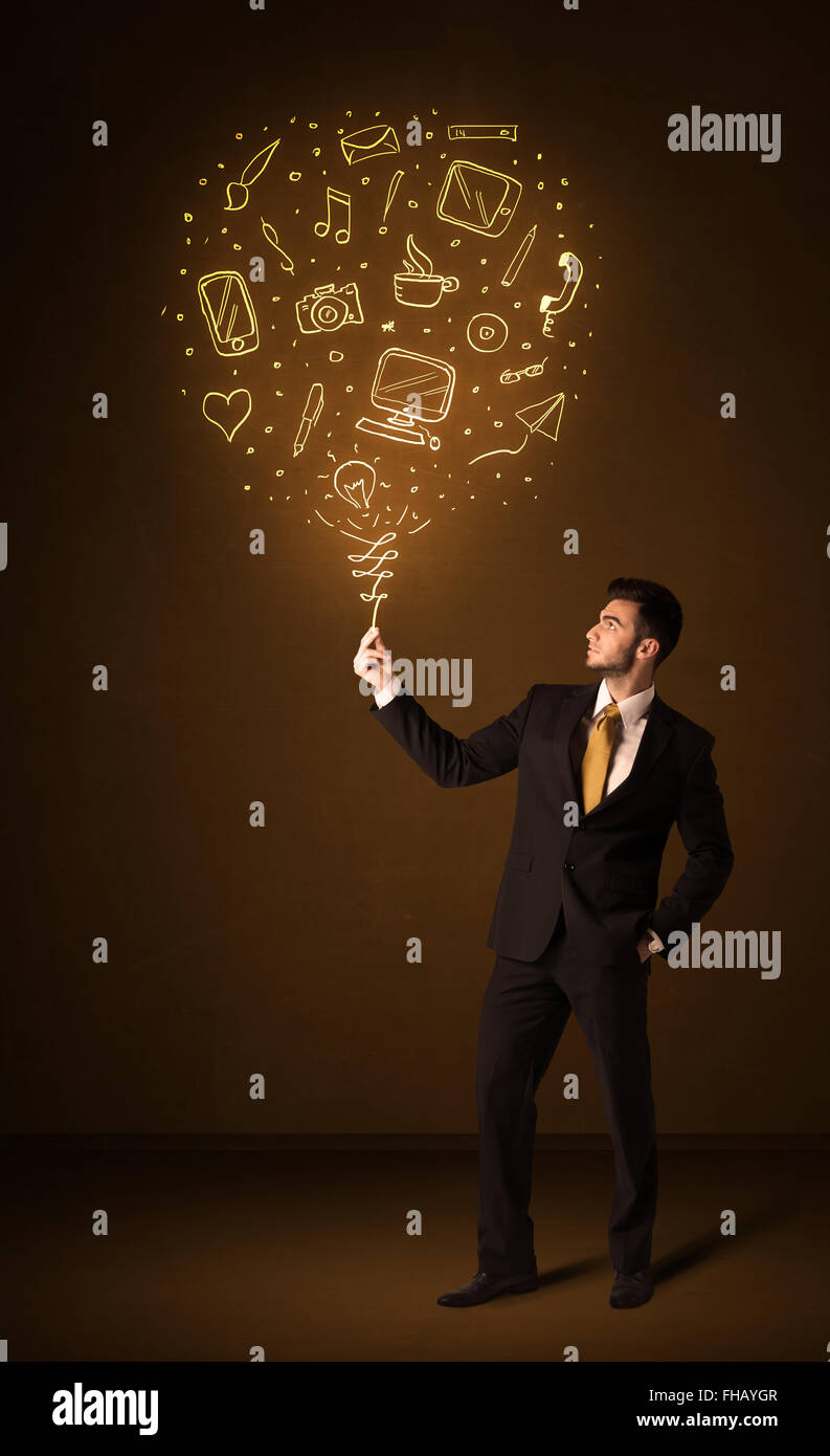 Businessman with a social media balloon Stock Photo - Alamy