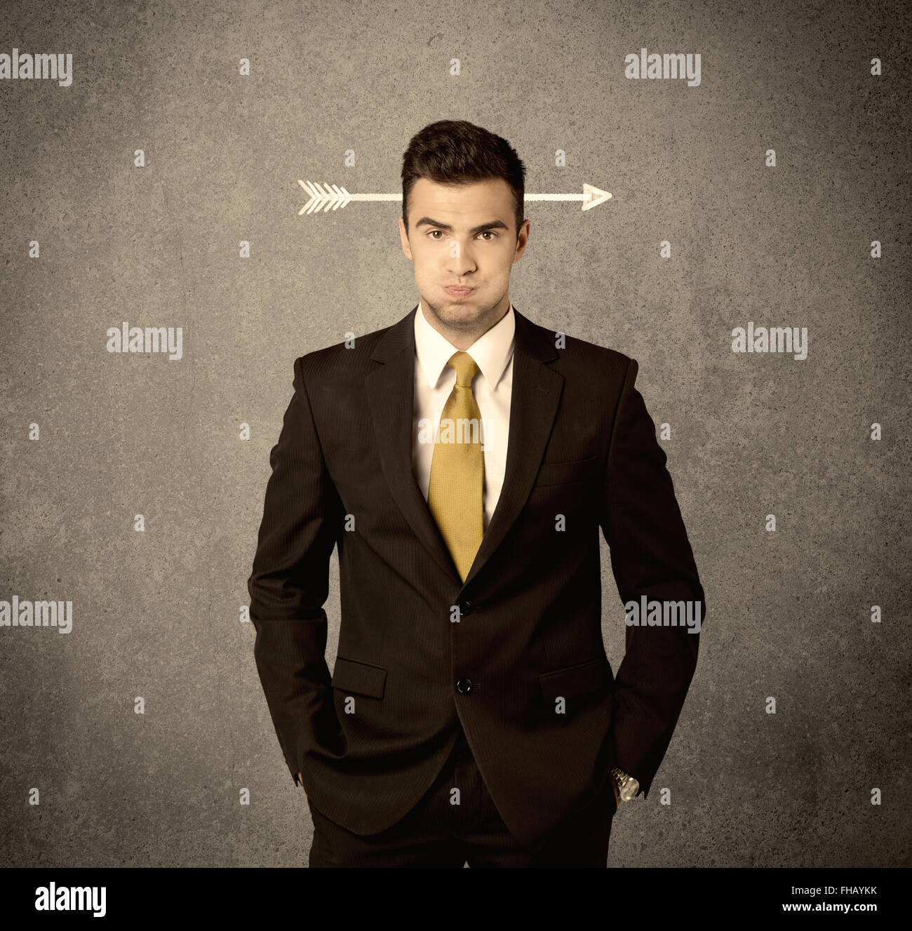 Young sales guy with arrow in the head Stock Photo - Alamy