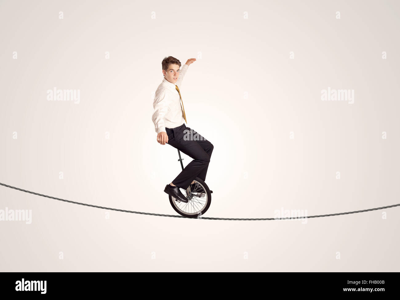 Man riding unicycle hi-res stock photography and images - Alamy