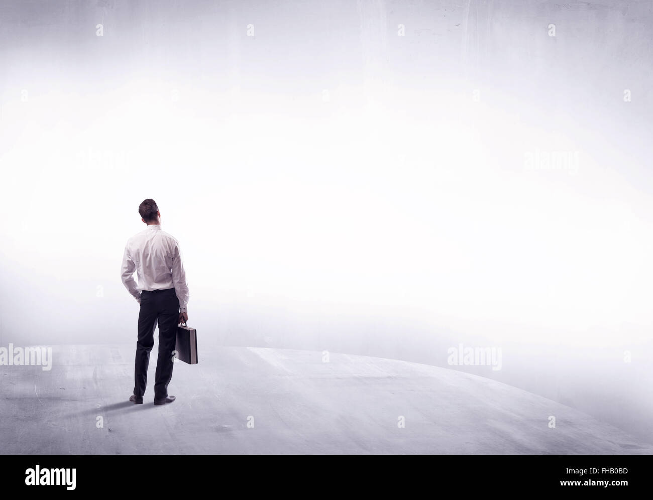 Business person standing from rear view Stock Photo - Alamy