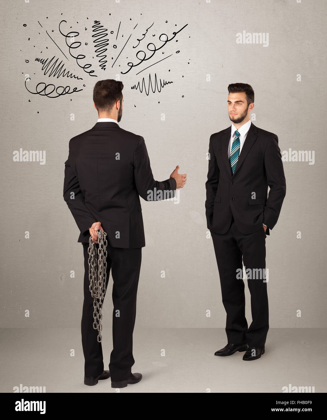 Angry business handshake concept Stock Photo - Alamy