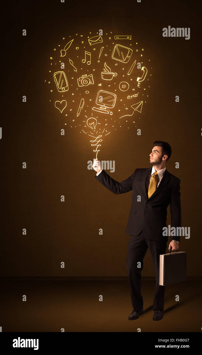 Businessman with a social media balloon Stock Photo - Alamy