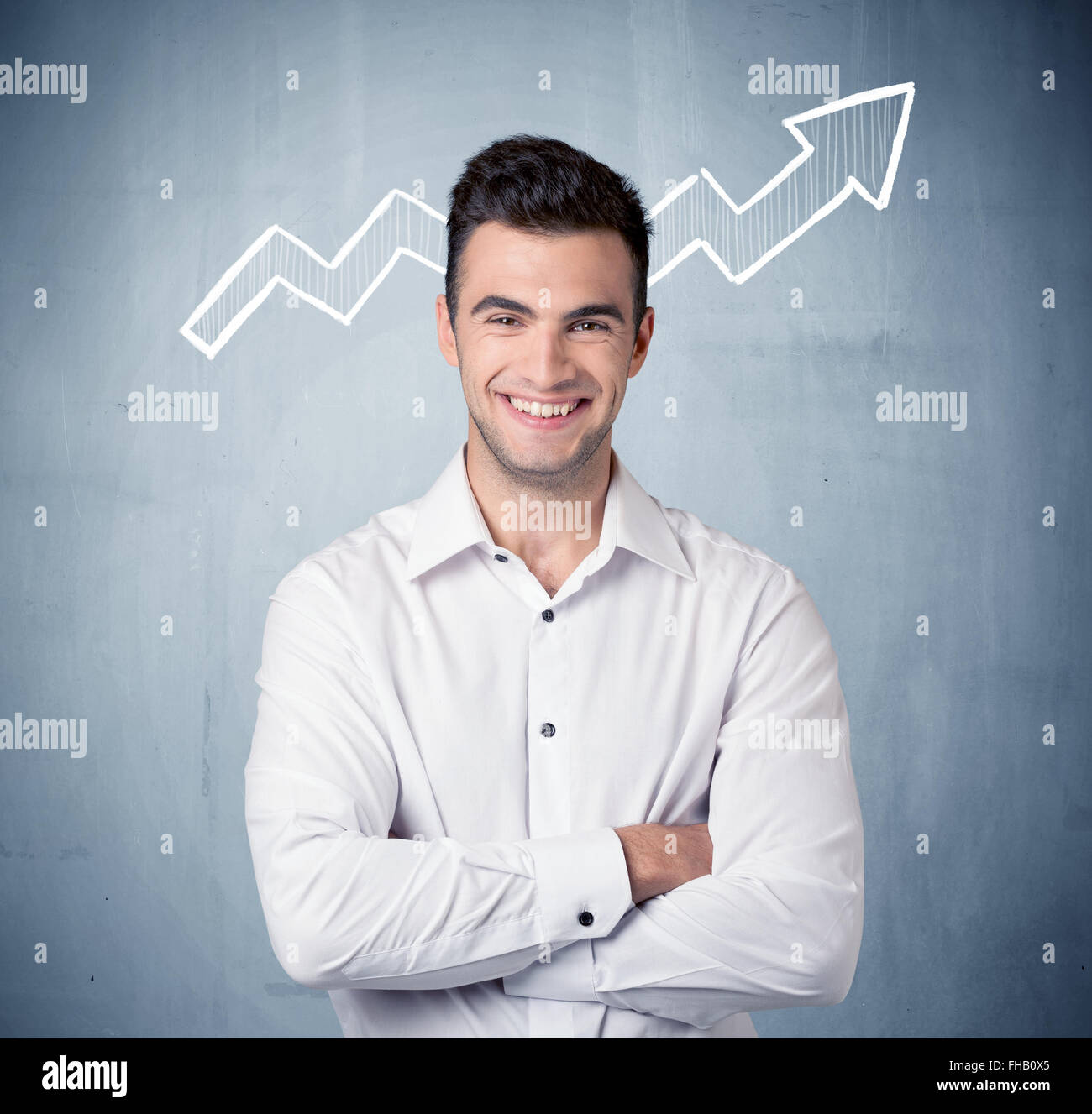 Smiling business guy with graph arrow Stock Photo - Alamy