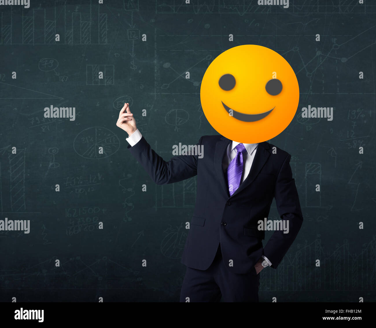 businessman wears yellow smiley face Stock Photo - Alamy