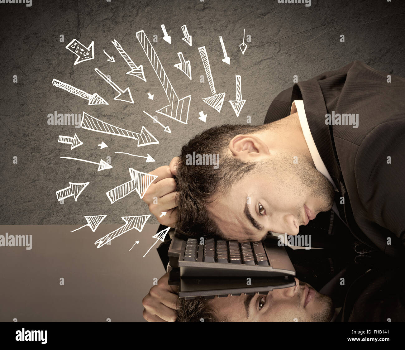 Arrows pointing at sad office worker Stock Photo - Alamy
