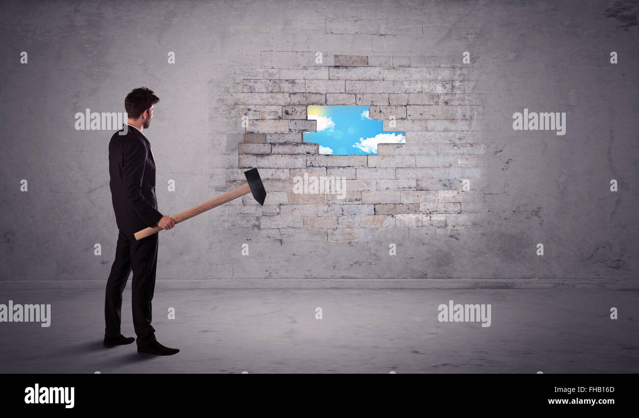 Business man hitting wall hammer hi-res stock photography and images ...