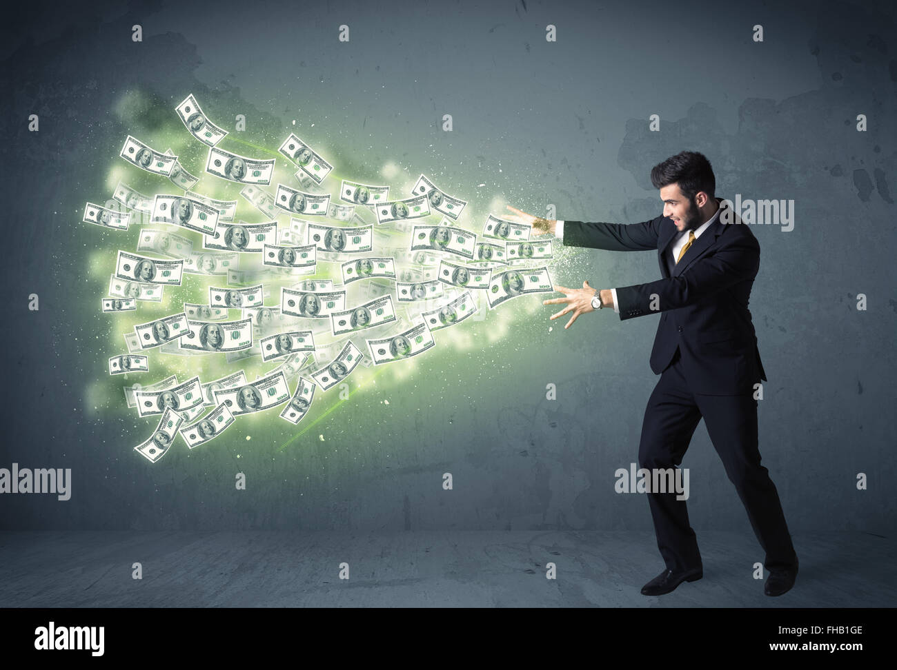 Business person throwing a lot of dollar bills concept Stock Photo - Alamy