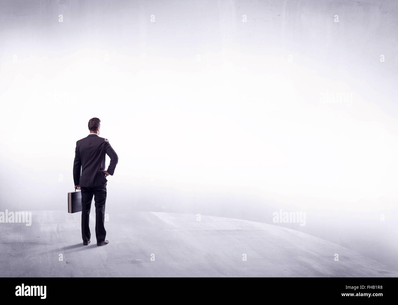 Business person standing from rear view Stock Photo - Alamy