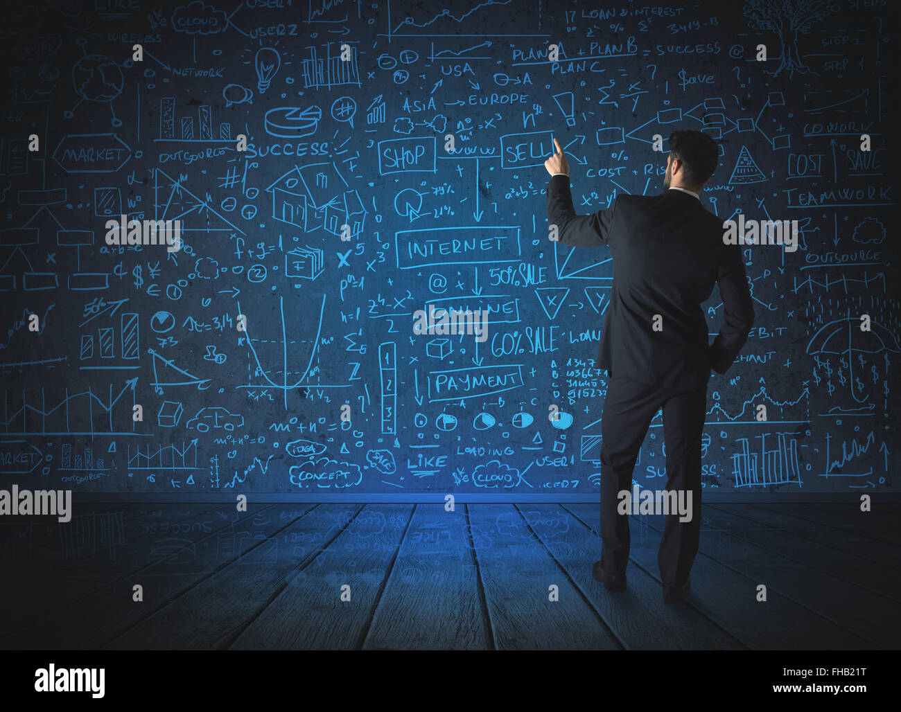 Drawing businessman with economy project background Stock Photo - Alamy