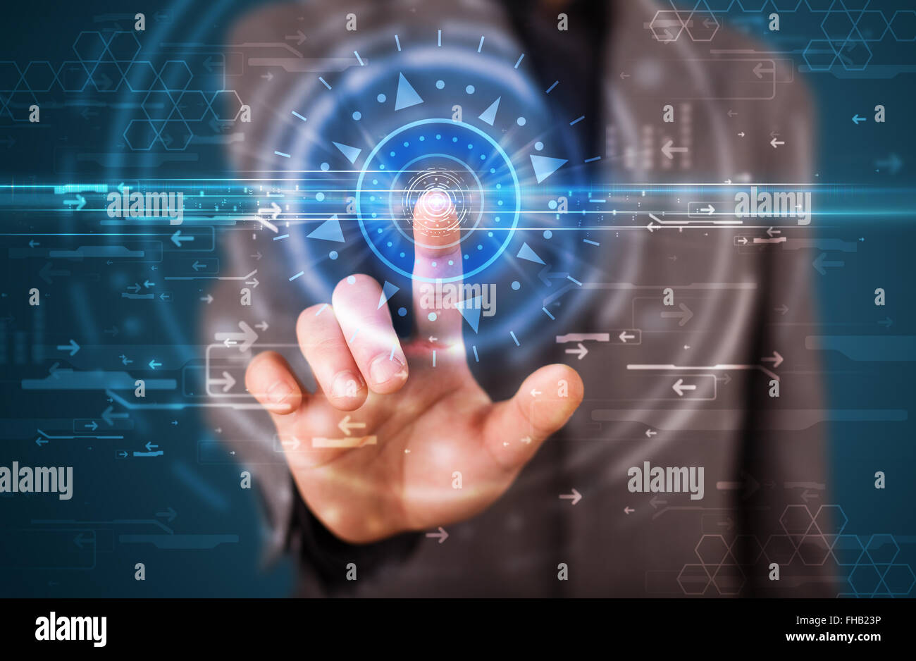 Handsome tech guy pressing high technology control panel screen concept ...