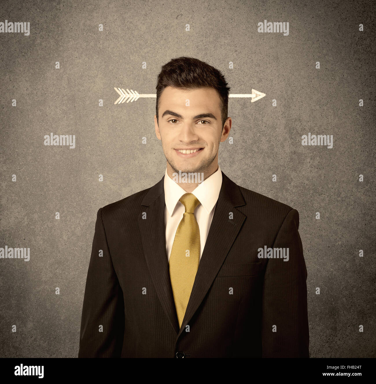 Young sales guy with arrow in the head Stock Photo - Alamy