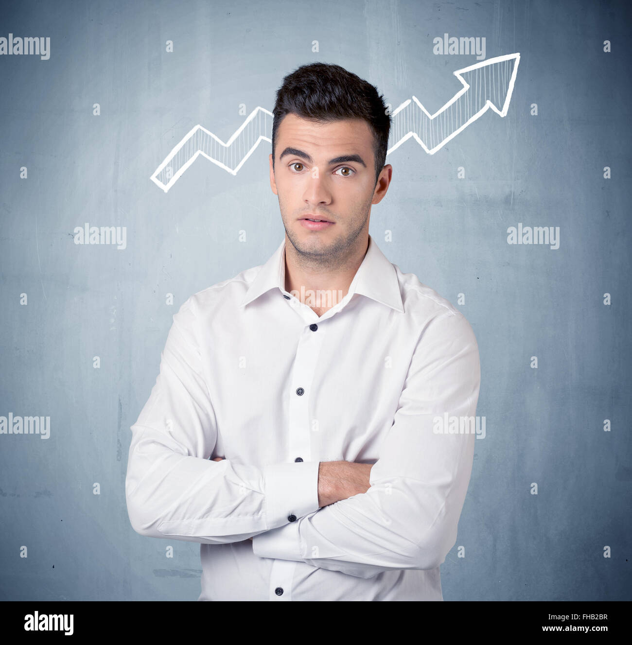 Smiling business guy with graph arrow Stock Photo - Alamy