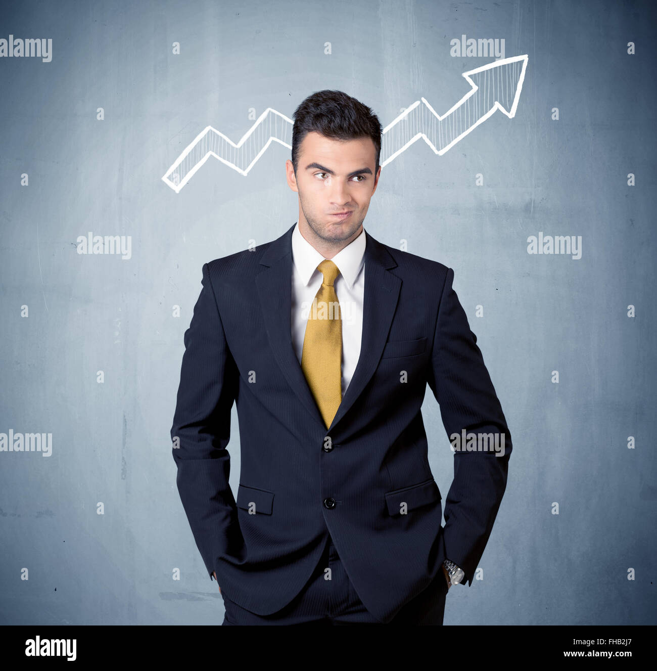 Smiling business guy with graph arrow Stock Photo - Alamy