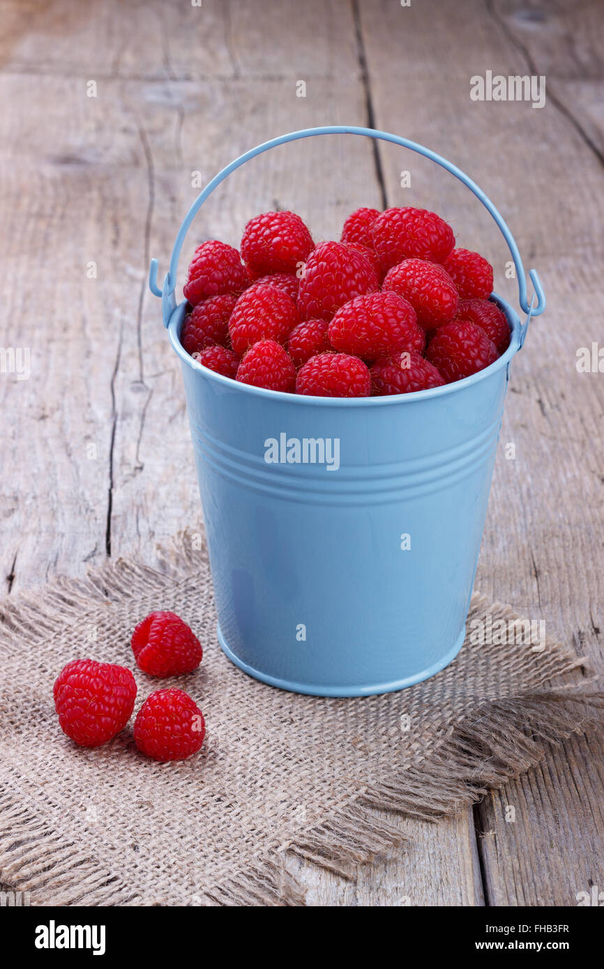Ripe raspberry in bucket hi-res stock photography and images - Alamy