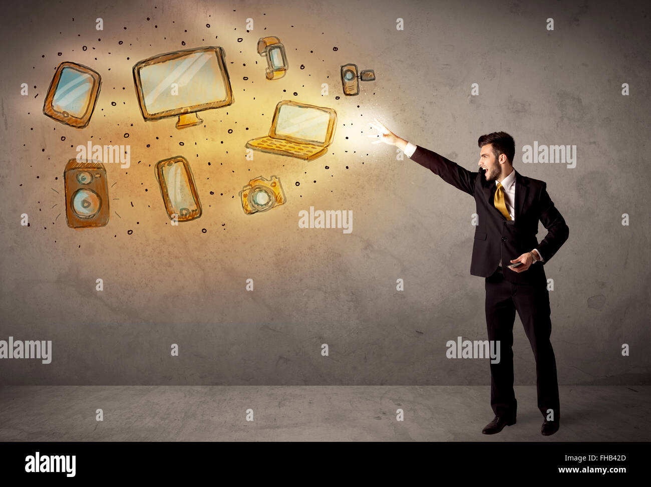 Man throwing hand drawn electronical devices Stock Photo - Alamy